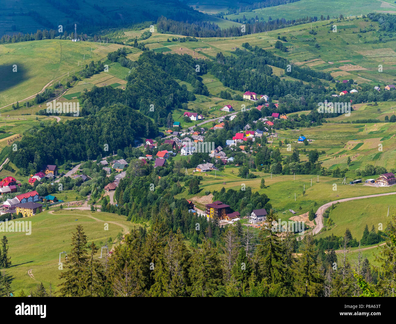Small villages with lovely beautiful houses among green trees and vast ...
