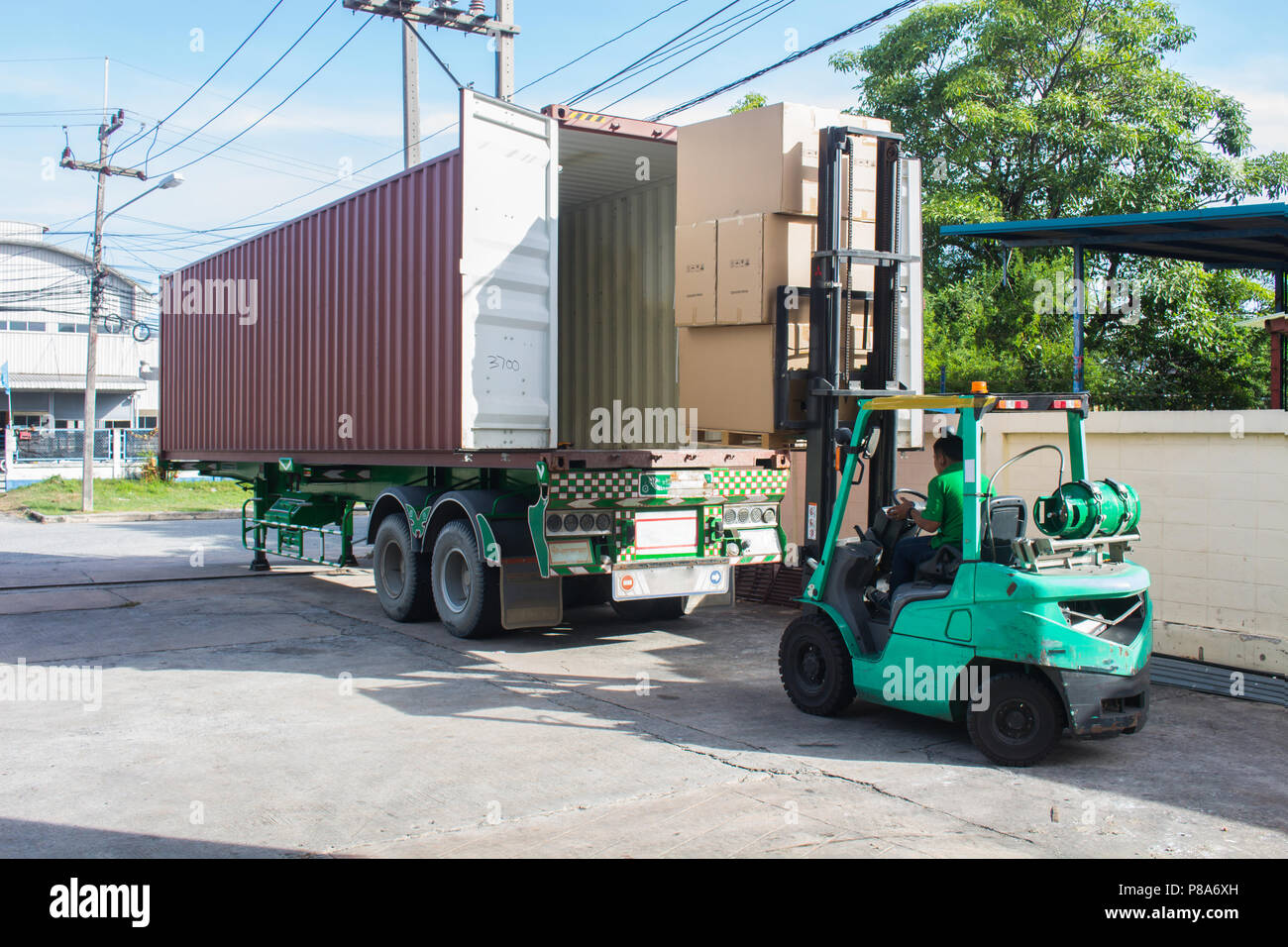 Forklift truck loading unloading shipping hi-res stock photography and ...