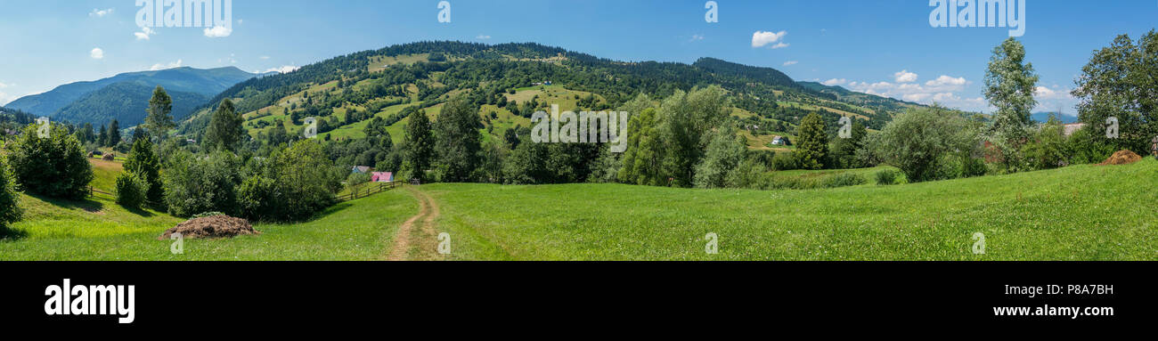 panorama to the path leading to houses and mountains . For your design ...