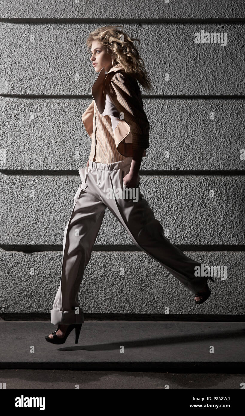 Street fashion concept: full body portrait of young beautiful woman ...