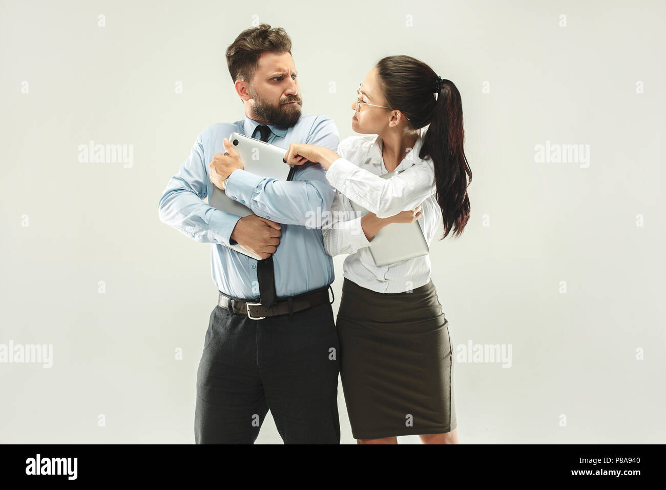 Angry boss. Woman and secretary standing at office or studio Stock ...