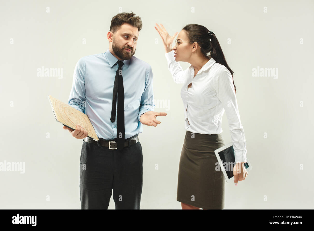 Angry boss. Woman and secretary standing at office or studio Stock ...