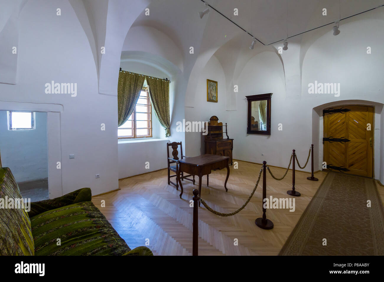 An ancient room with beautifully preserved pieces of furniture from old ...