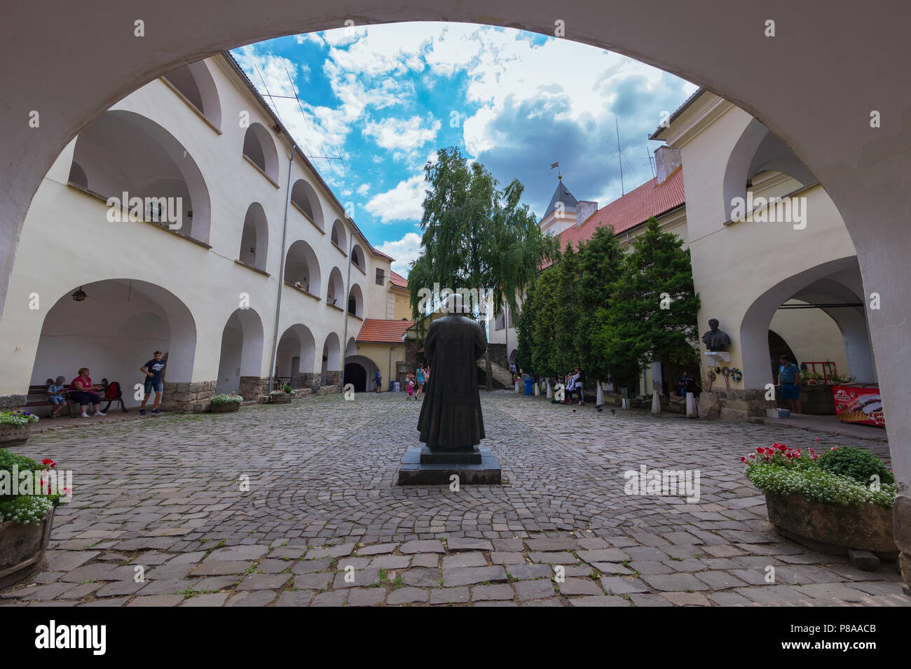 A beautiful monument in the middle of an ancient square with beautiful ...