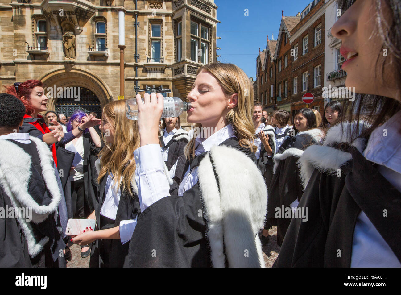 Students from Cambridge University on their way to the Senate House to ...