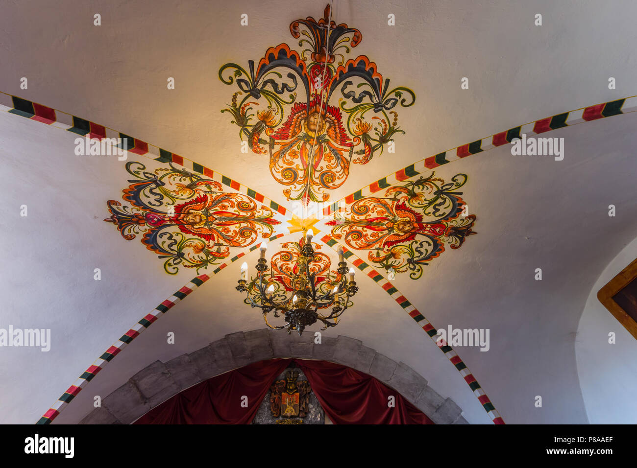 painted with decorative patterns of the ceiling of a medieval rich ...