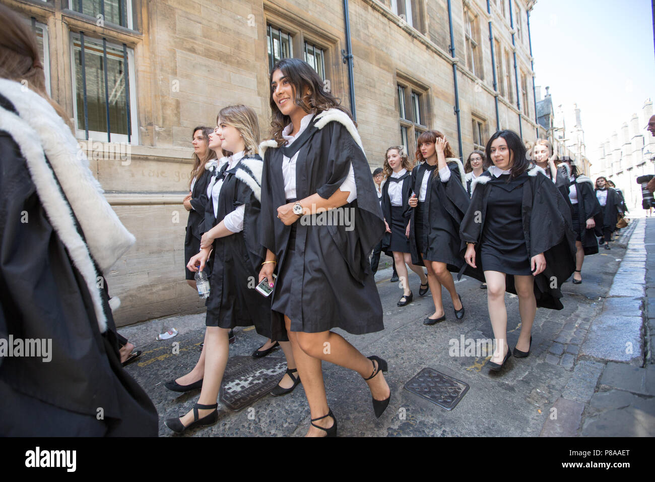 Students from Cambridge University on their way to the Senate House to ...
