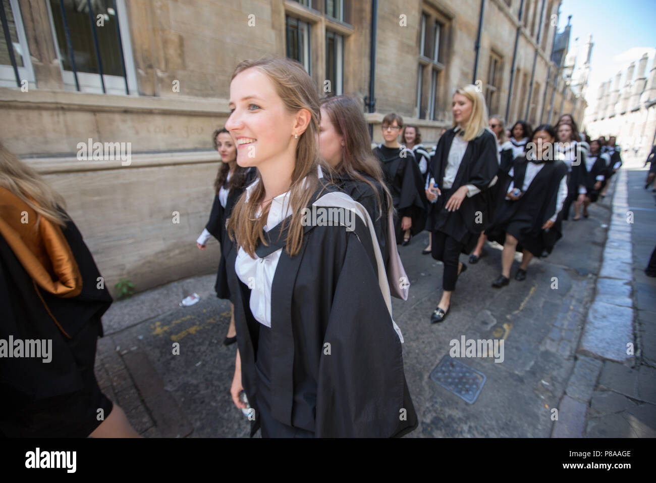 Students from Cambridge University on their way to the Senate House to ...