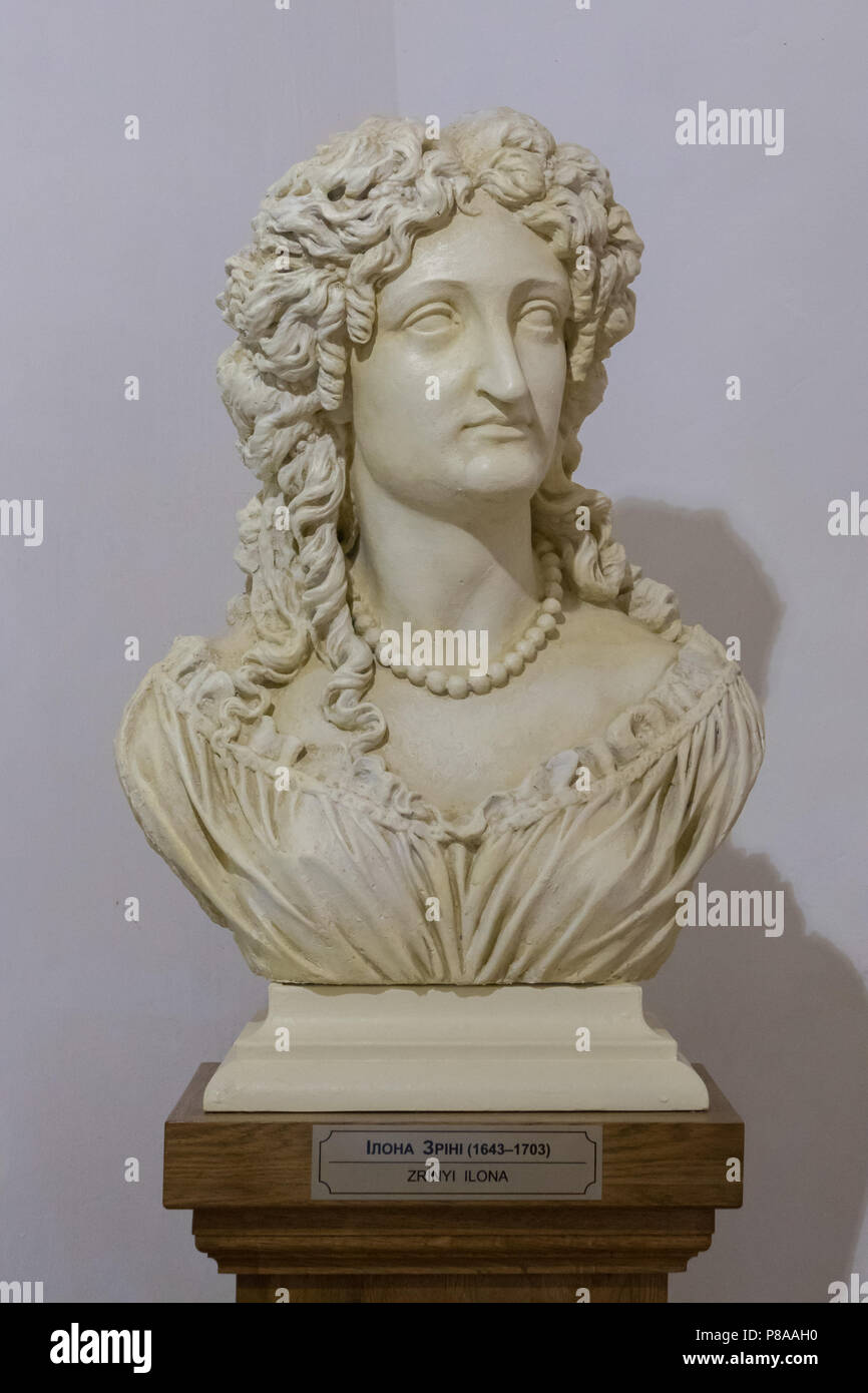 historically a woman's bust in a museum with a commemorative plaque ...