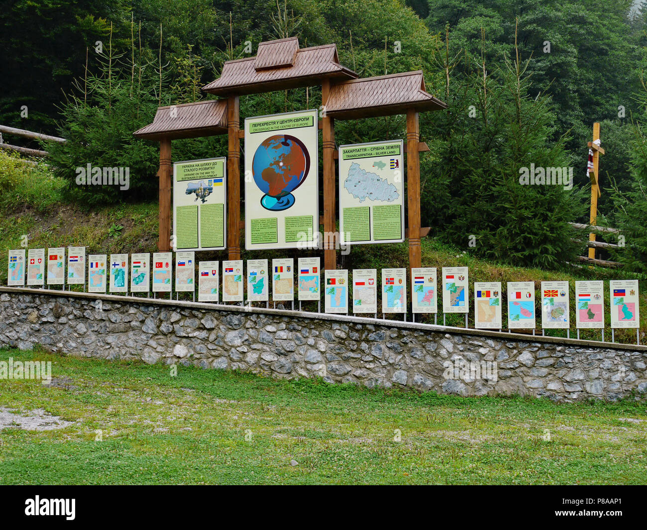 Information corner in the Carpathians with signs indicating important ...