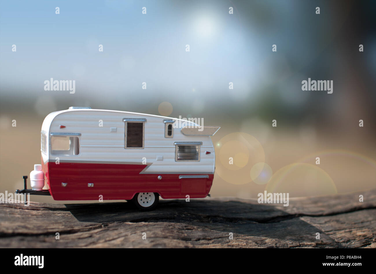 Miniature caravan trailer in the summer countryside Stock Photo - Alamy