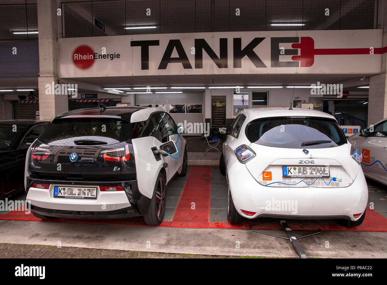 electric cars at a charging station at the street Lungengasse, Cologne ...