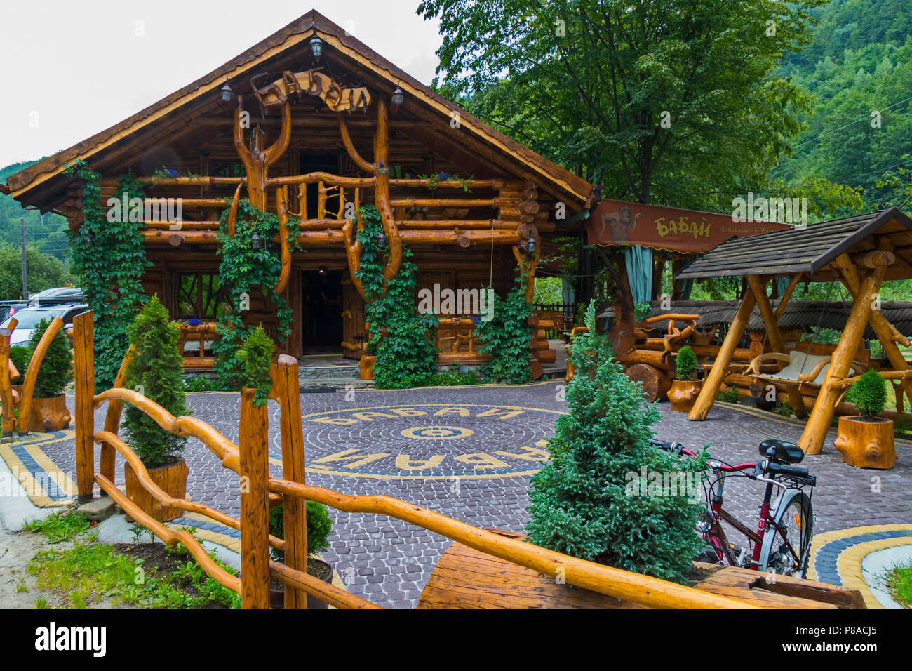 Authentic restaurant complex built of wood and paved with tiles on the ...