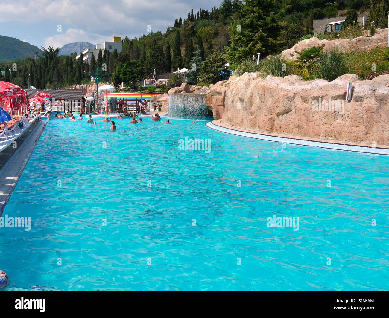Hotel swimming pool waterfall hi-res stock photography and images - Alamy
