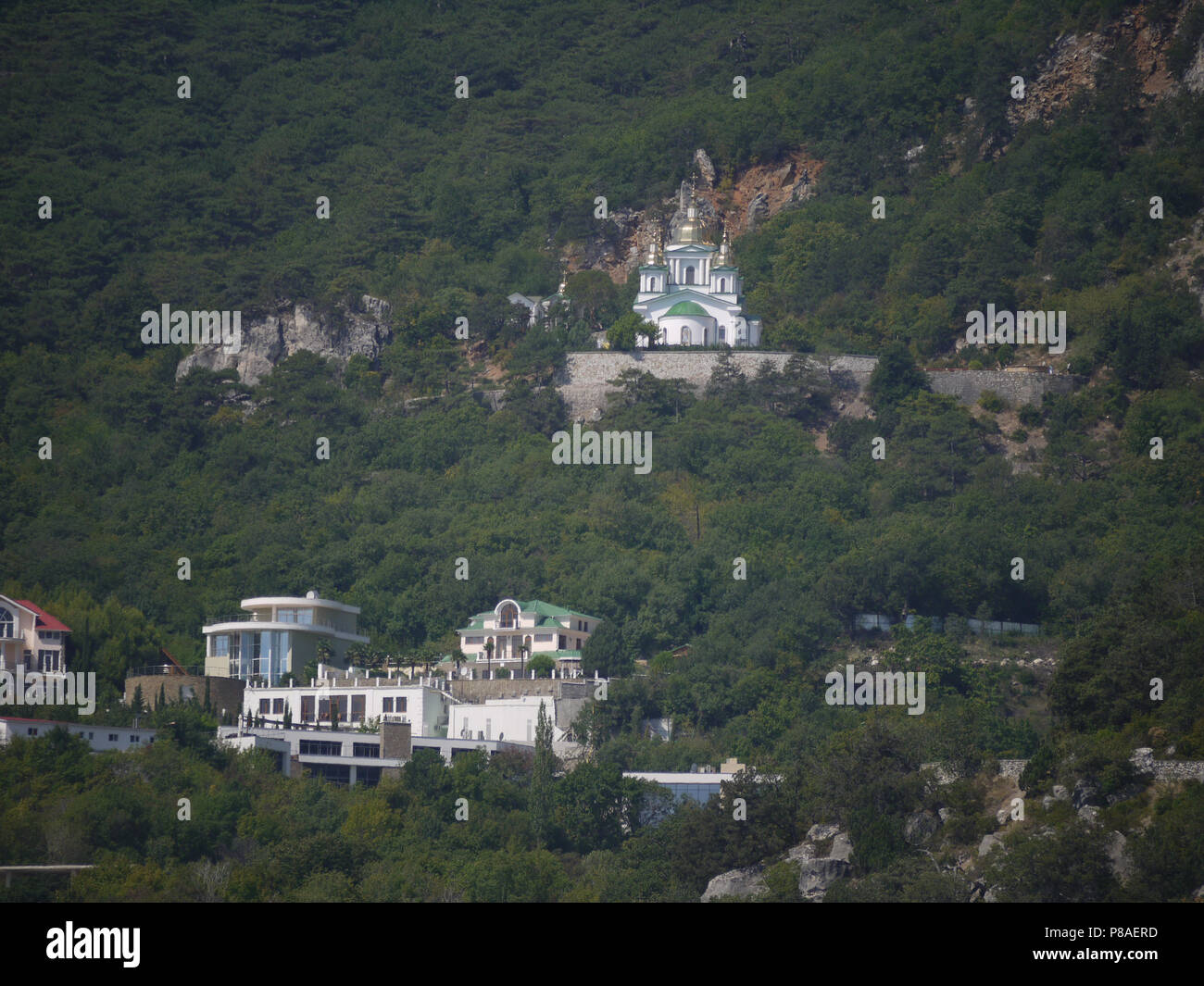Mountain church on the slope hi-res stock photography and images - Alamy