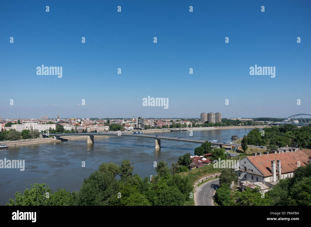 Cityscape in Novi Sad with Varadin bridge (Duga) and the Danube river ...