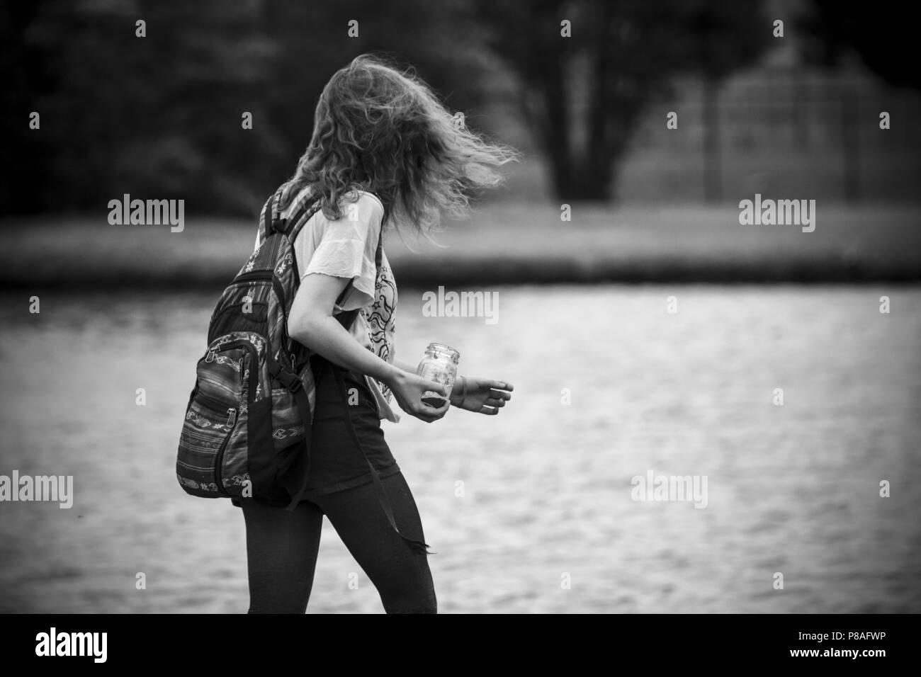 Woman and girl walking Black and White Stock Photos & Images - Alamy