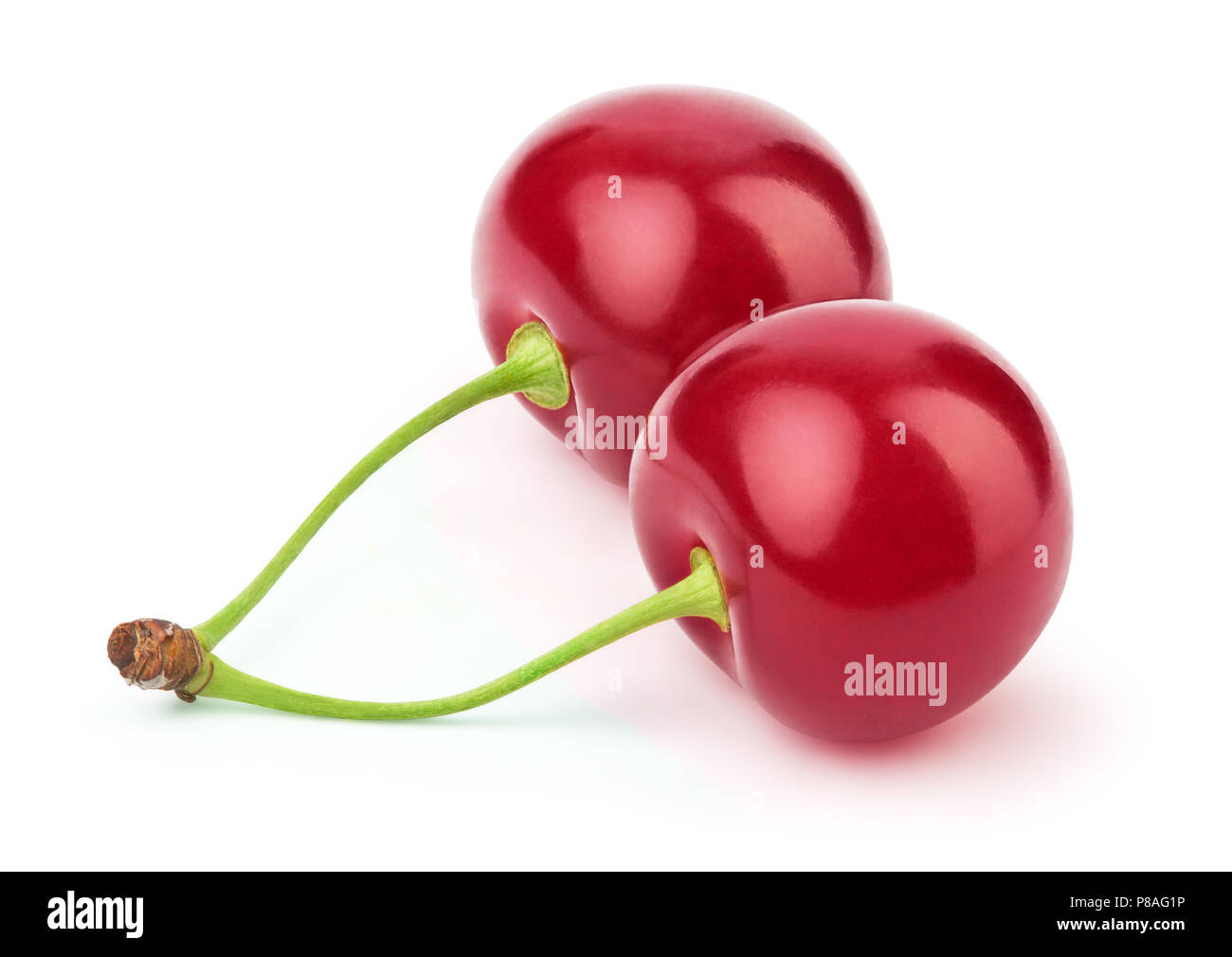 Two fresh cherries isolated on white Stock Photo - Alamy