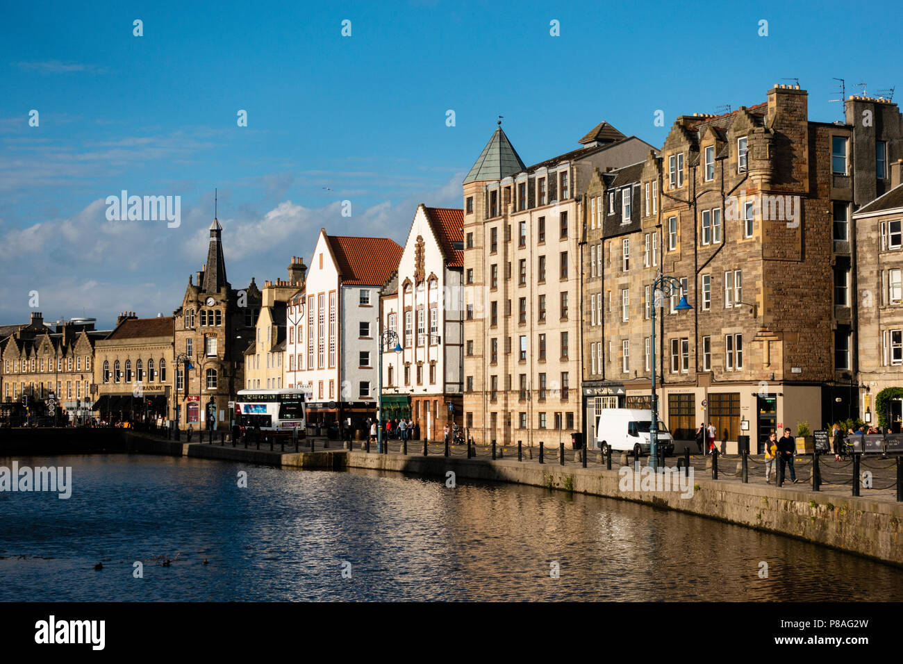 Evening summer sunshine on The Shore beside the Water of Leith in Leith ...