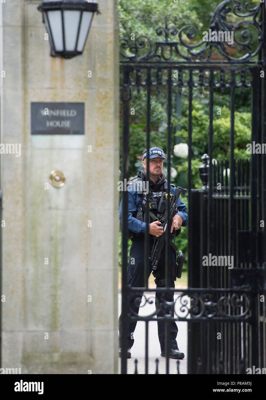 An armed police officer at us ambassadors residence winfield house hi ...