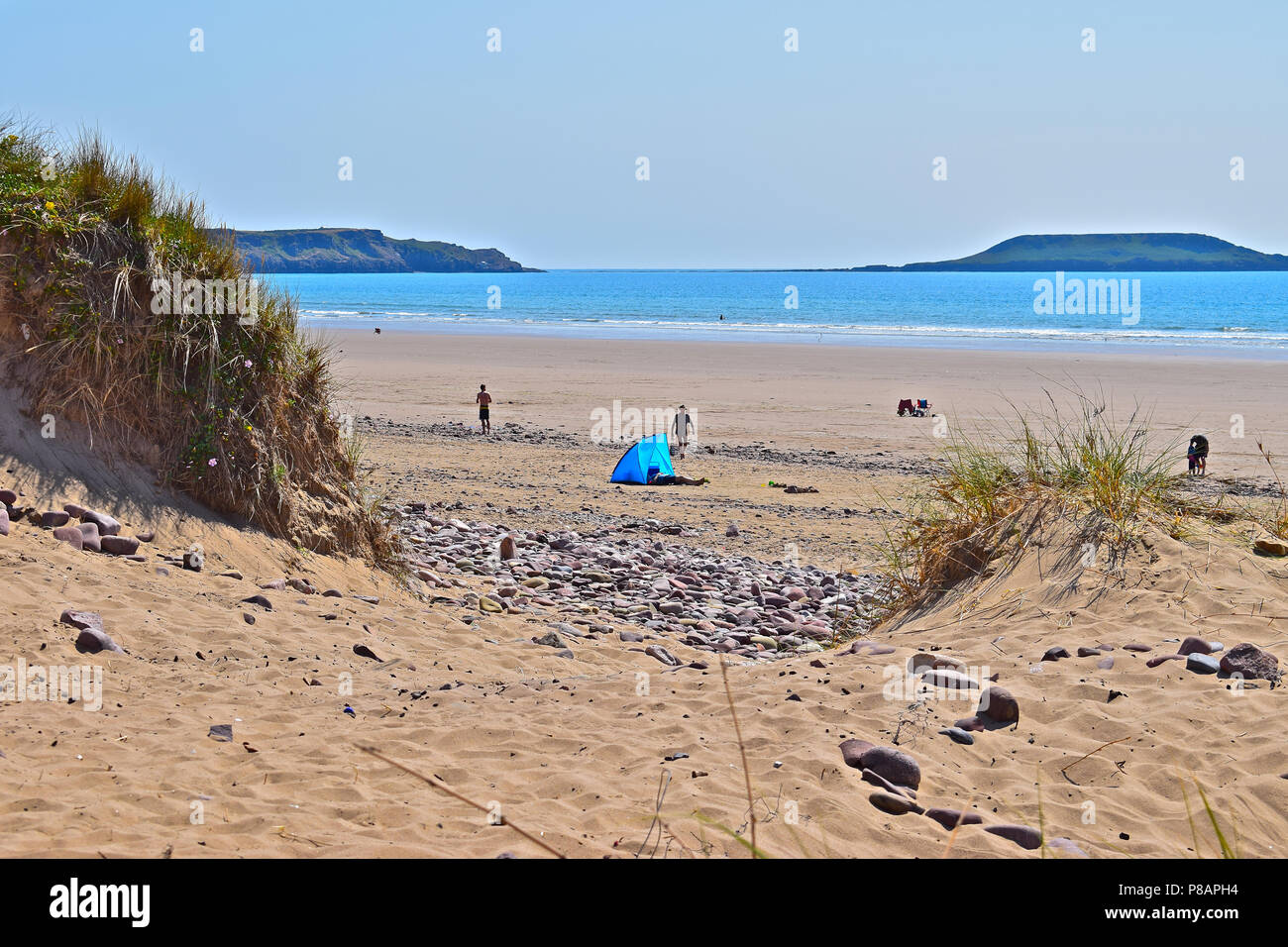 The beach at Llangennith looking towards Worms Head, Rhossili Bay ...