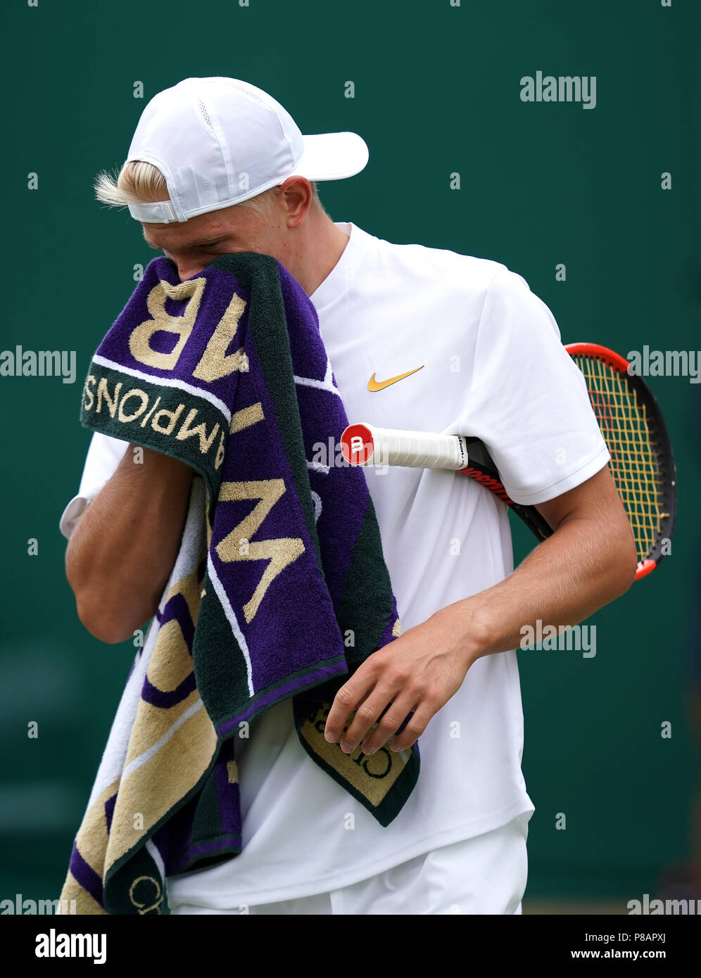 Anton Matusevich with an official towel on day eight of the Wimbledon ...