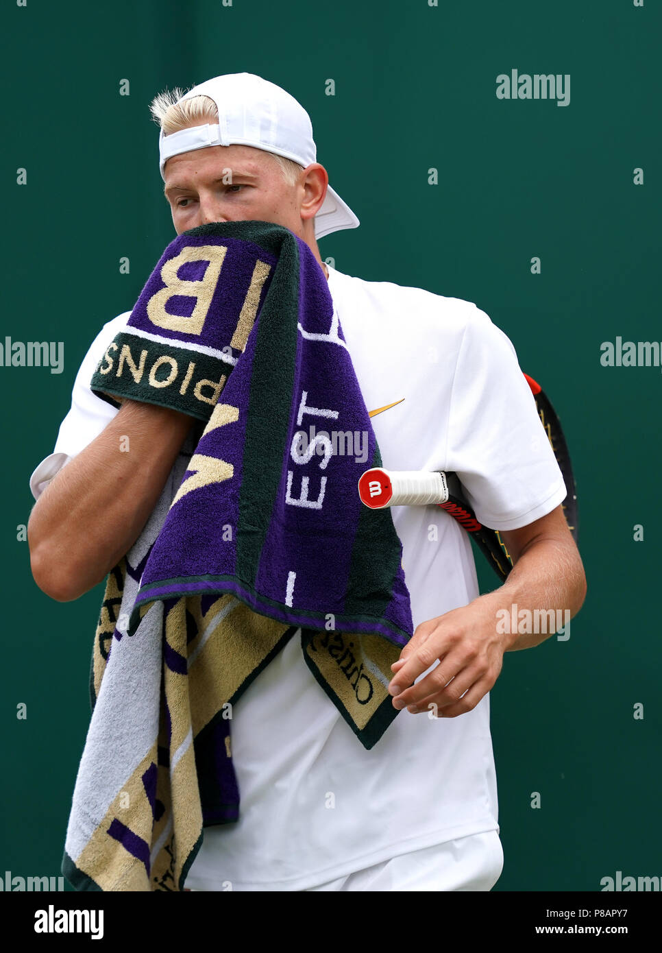 Anton Matusevich with an official towel on day eight of the Wimbledon ...