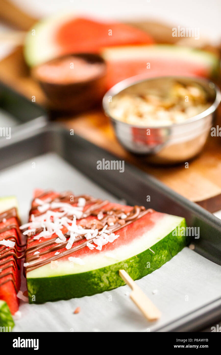 Watermelon drizzled with chocolate and topped with flaked sea salt and ...