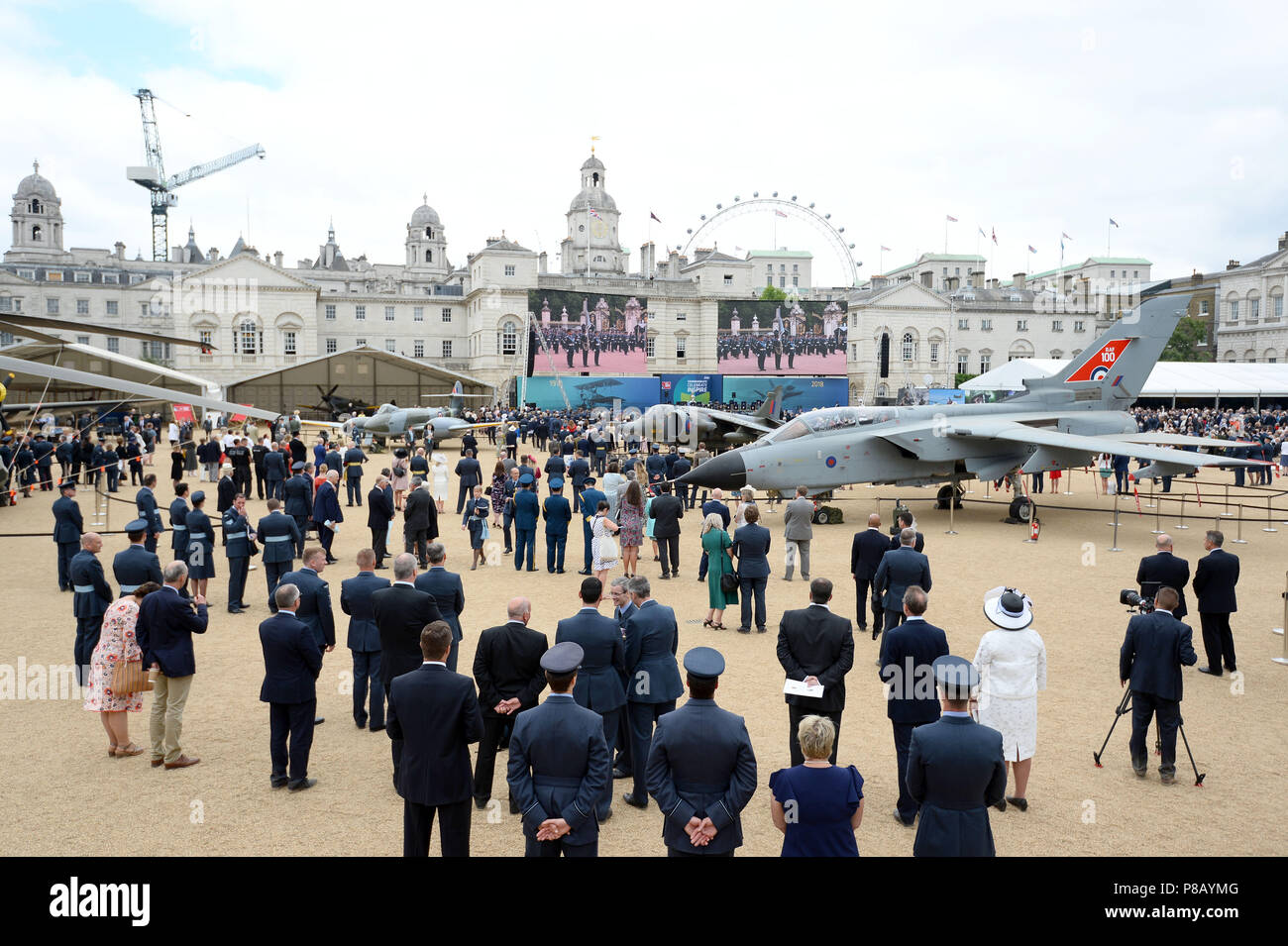 RAF veterans watch a flypast of 100 RAF aircraft over Buckingham Palace ...