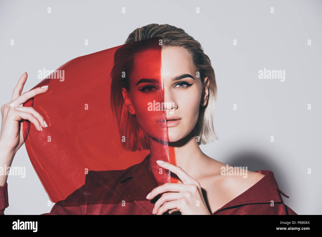 beautiful style girl posing with red filter for fashion shoot, isolated ...