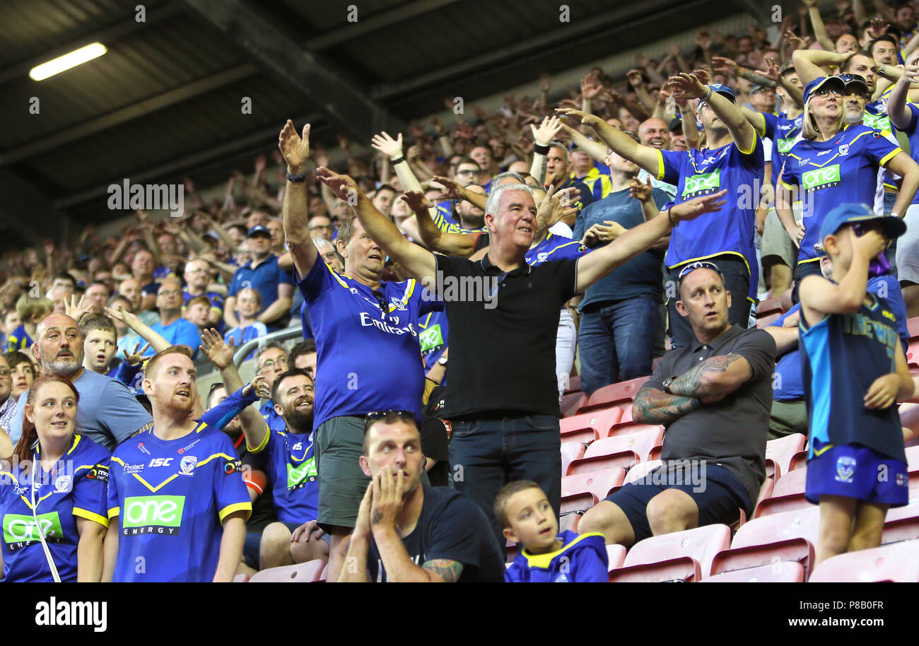 Warrington Wolves fans in the stands Stock Photo - Alamy