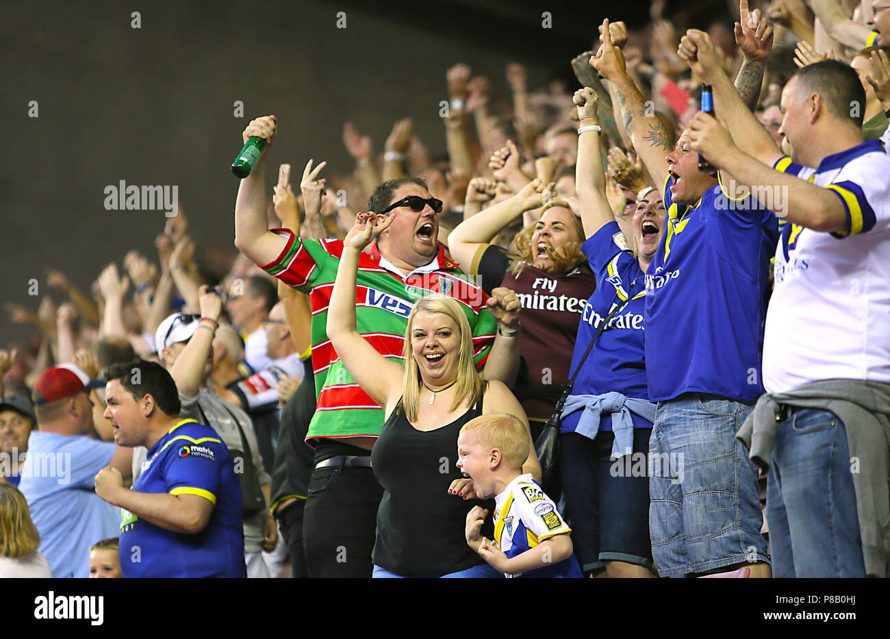 Warrington Wolves fans in the stands Stock Photo - Alamy