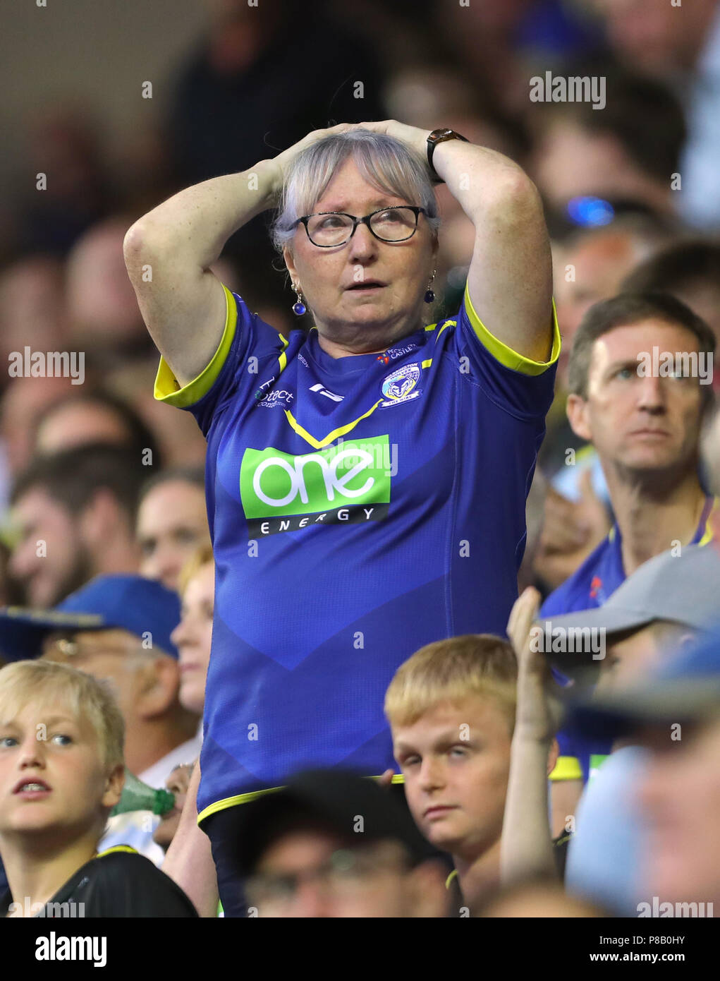 Warrington Wolves fans in the stands Stock Photo - Alamy