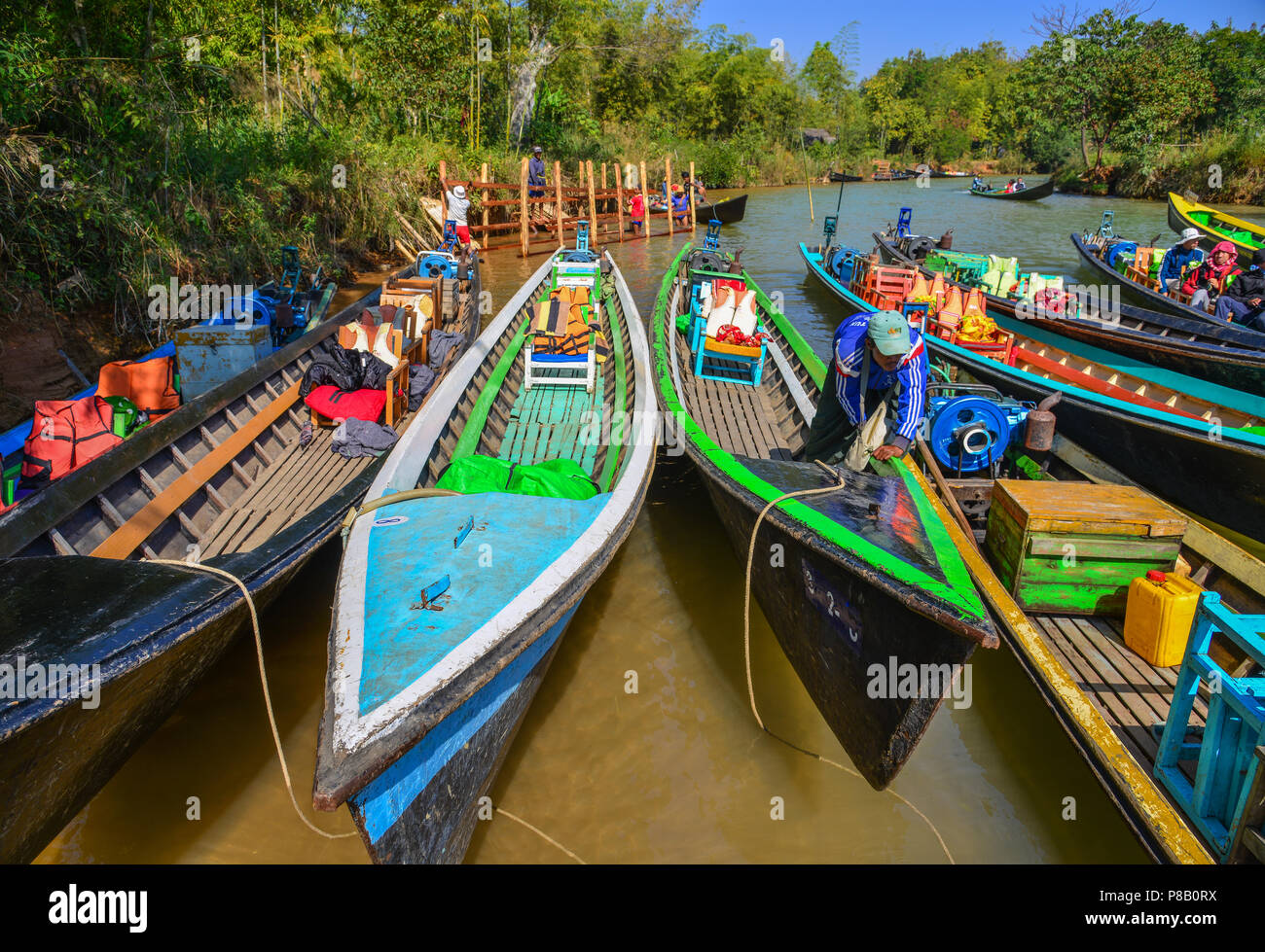 Inle Lake, Myanmar - Feb 7, 2018. Traditional wooden boats docking on ...