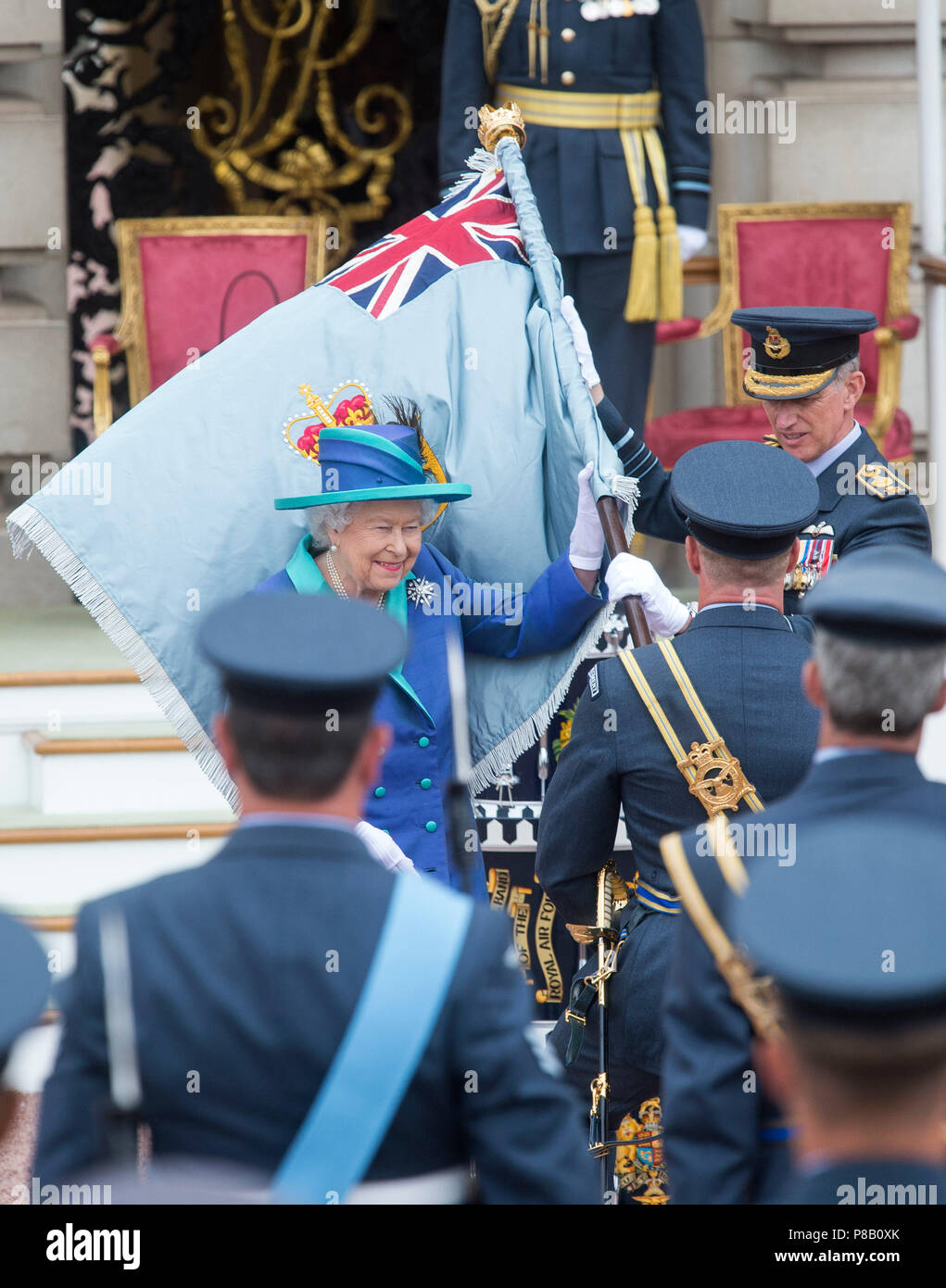 Queen Elizabeth II presents a new Queen's Colour to the Royal Air Force ...