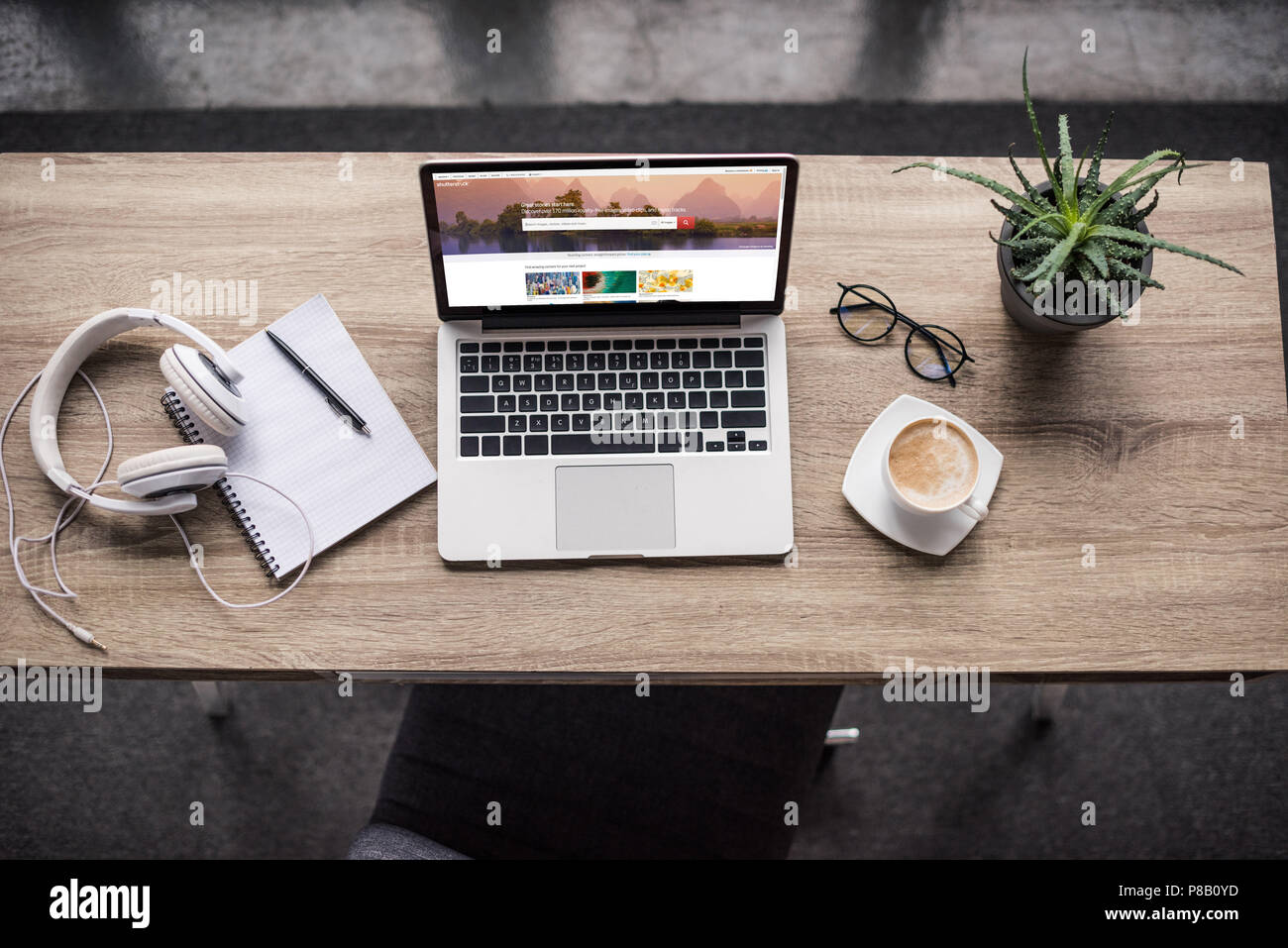top view of laptop standing at modern workplace with shutterstock ...