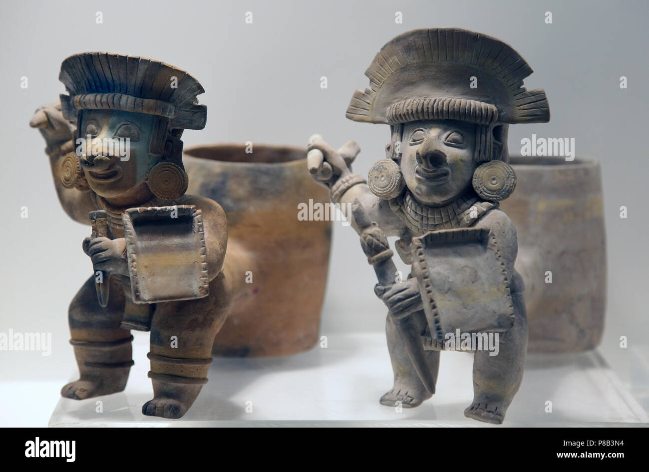 Ceramic figurine in the shape of a human figure.Representative of the ...