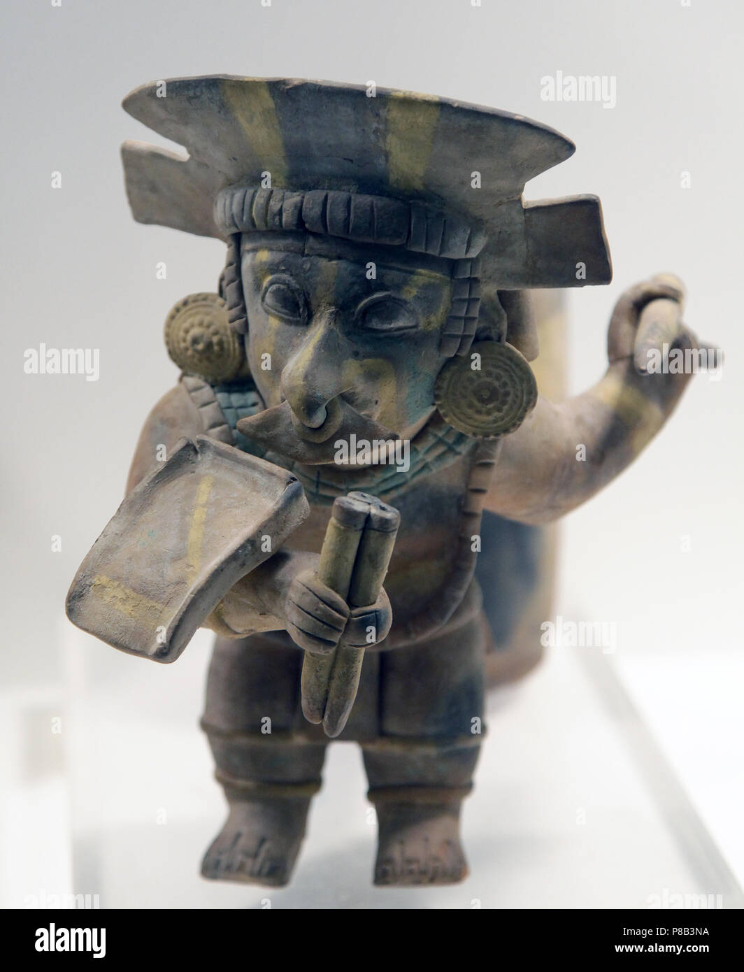 Ceramic figurine in the shape of a human figure.Representative of the ...