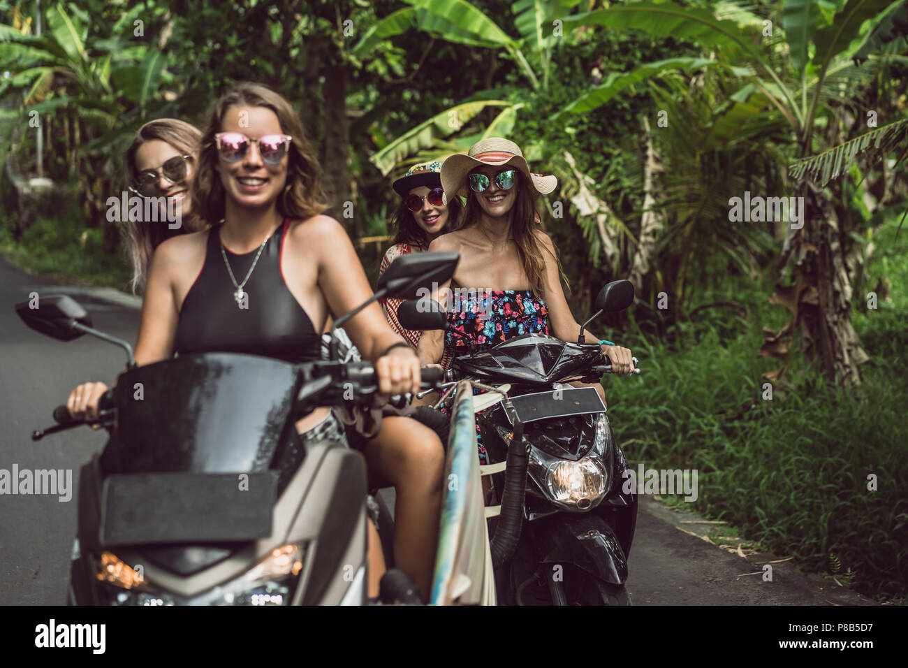 Girls with motorbikes High Resolution Stock Photography and Images - Alamy