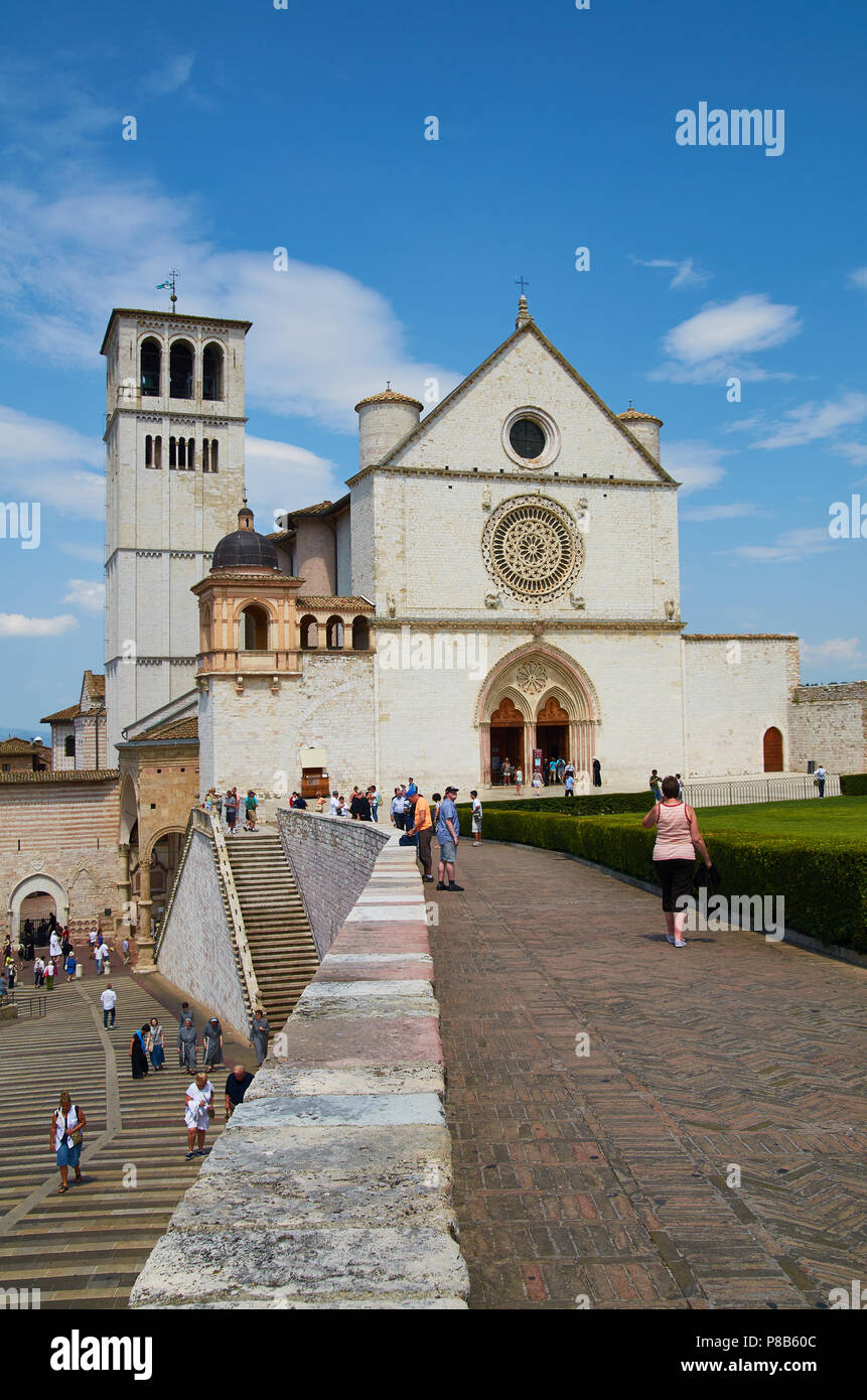 ASSISI, ITALY-JULY 9, 2013: Visitors approach the Papal Basilica of ...