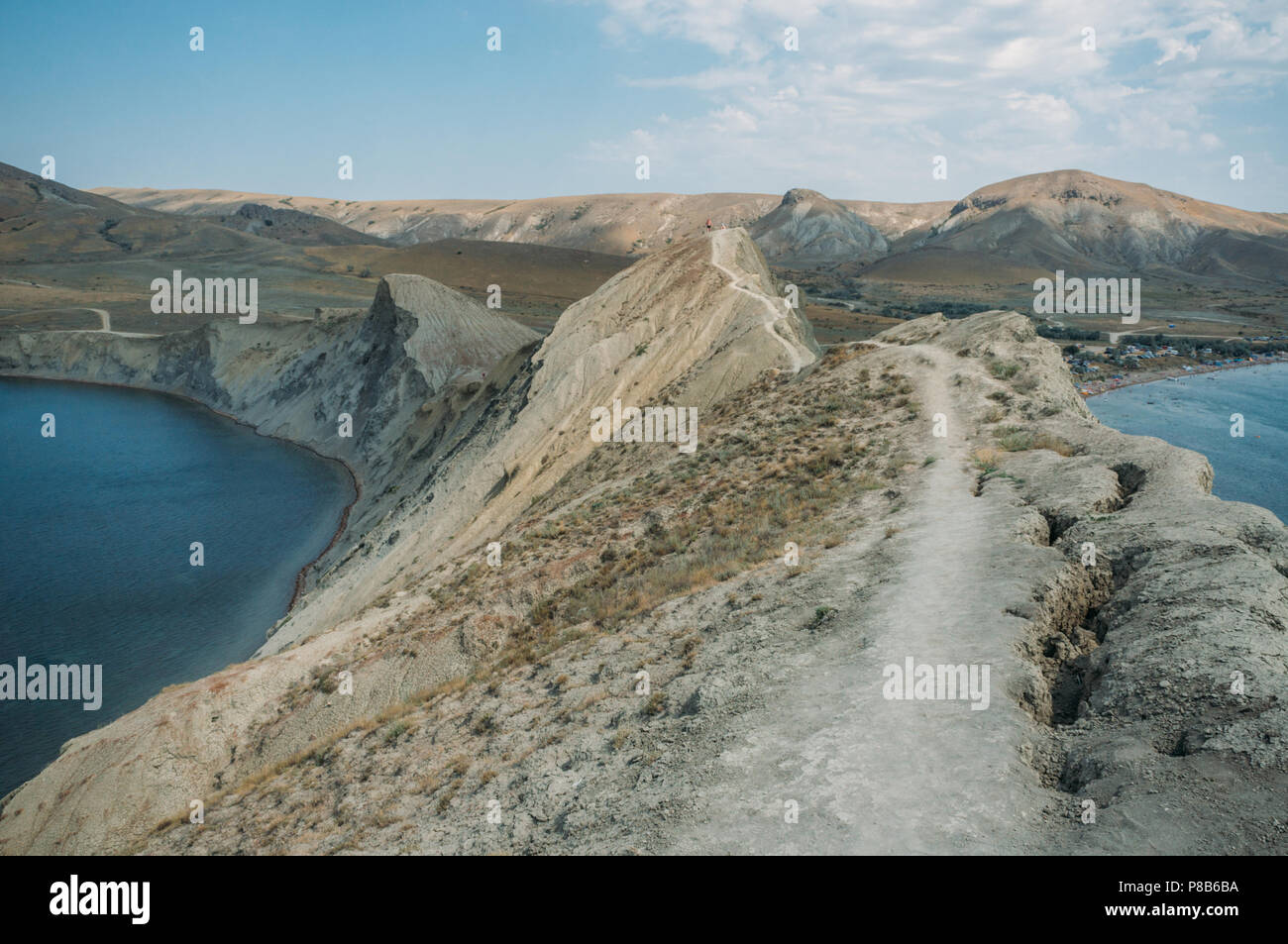Scenic calm seashore with Crimean mountains ridge, Ukraine, May 2013 ...
