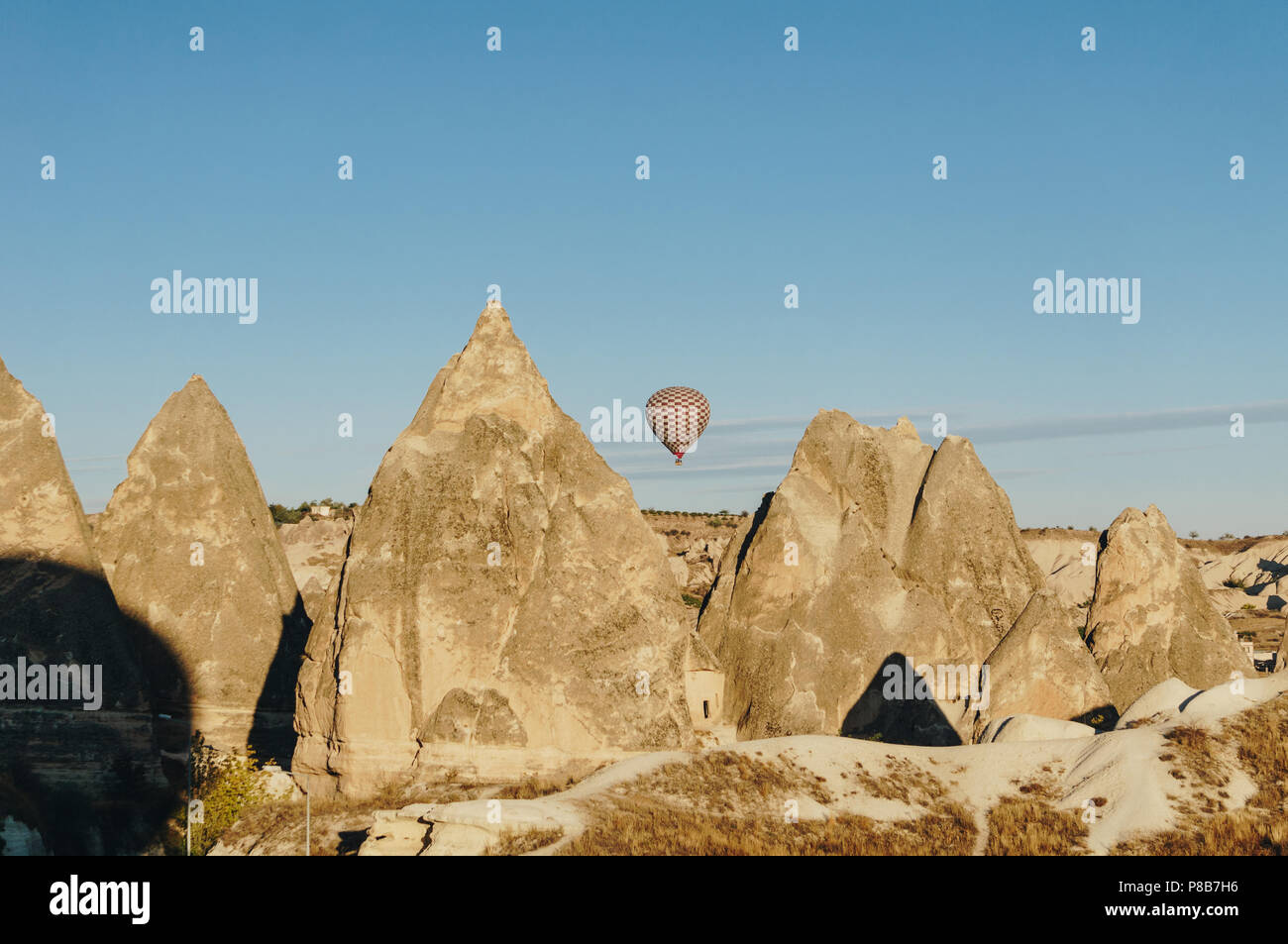 Hot air balloon flying in Goreme national park, fairy chimneys ...