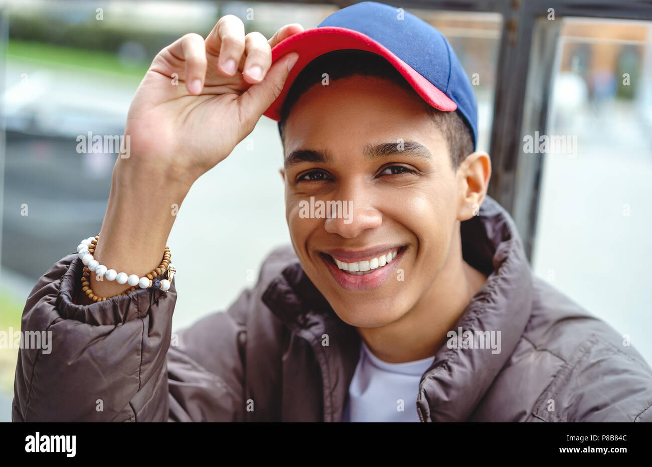 Smiling african american boy wearing cap Stock Photo - Alamy