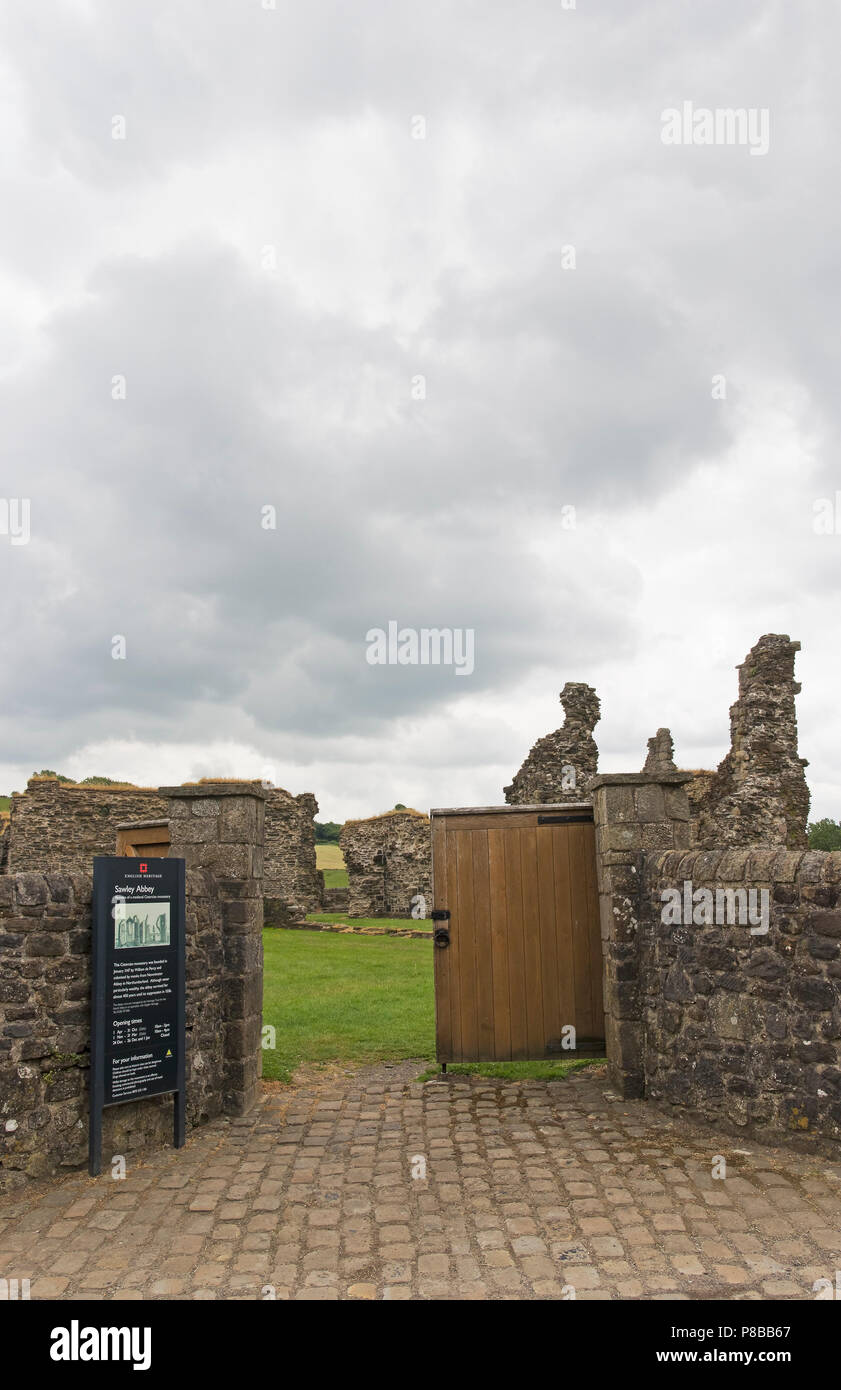 Entrance to the remains of Cistercian Sawley Abbey in the village of ...