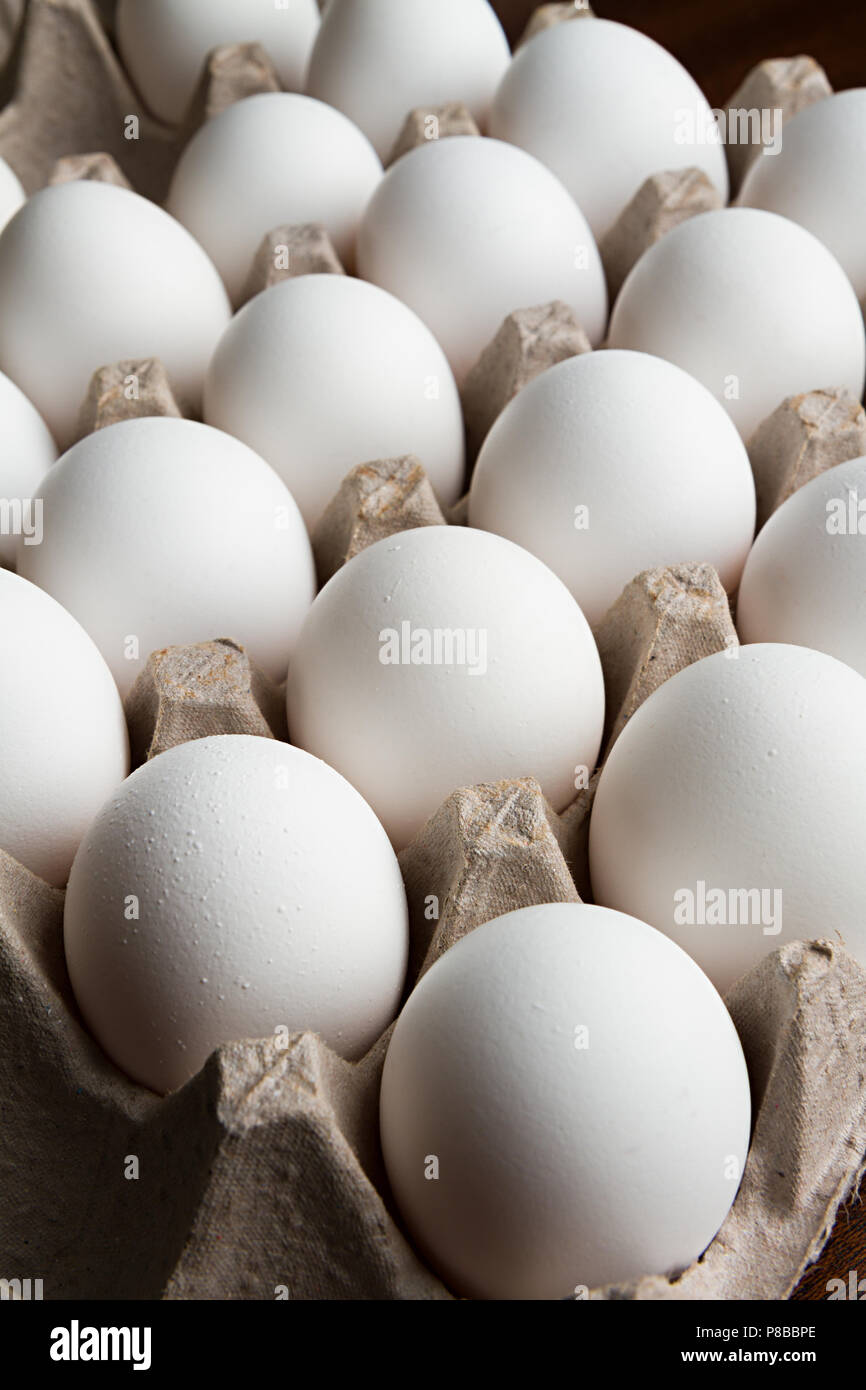 A carton of eggs still laying in their carton Stock Photo - Alamy