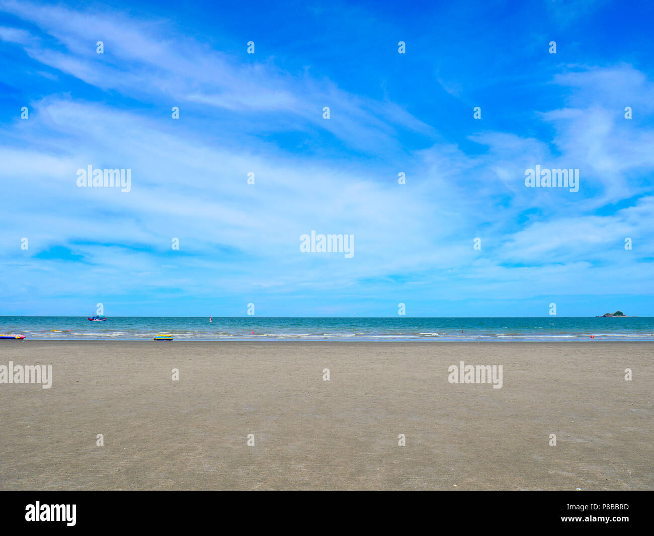 Sandy beaches with sea and blue sky background Stock Photo - Alamy