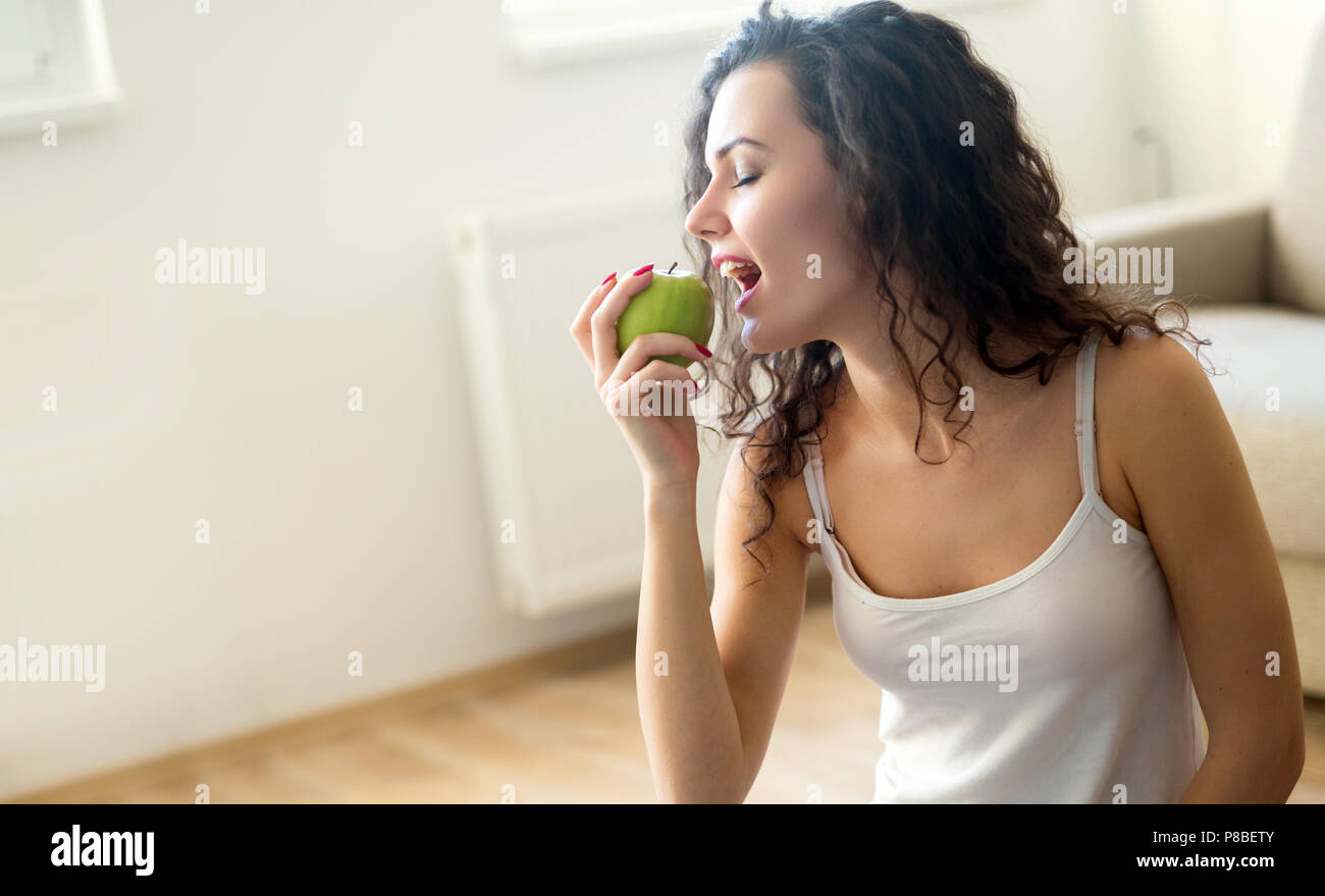 Fitness woman eating healthy food after workout Stock Photo - Alamy
