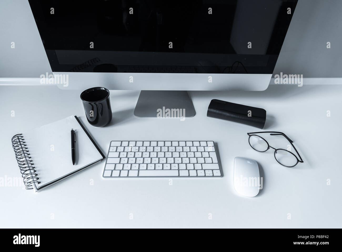 overhead view of keyboard, computer mouse and notebook Stock Photo - Alamy