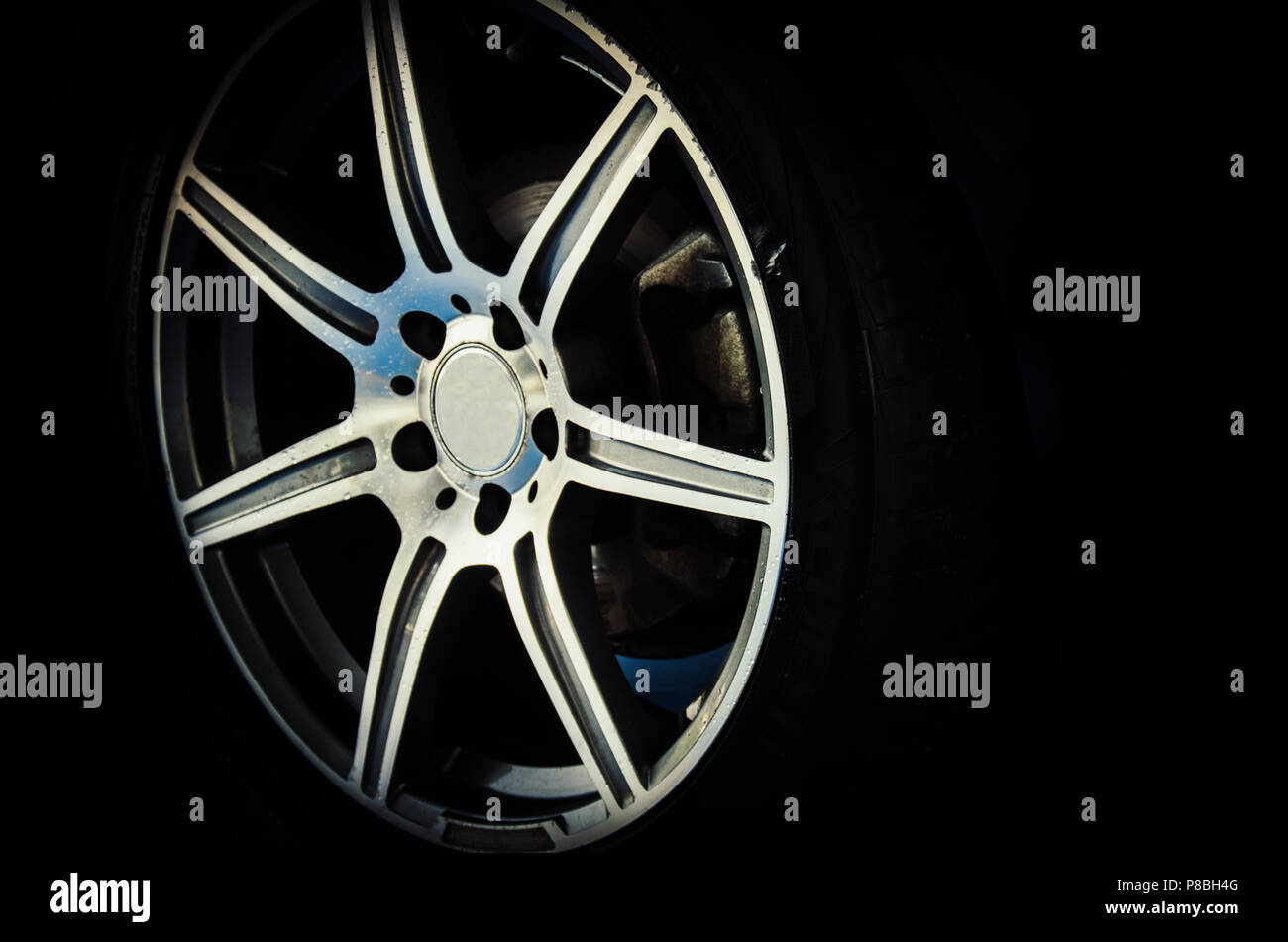 Luxury alloy wheel in close-up as an automotive Stock Photo - Alamy