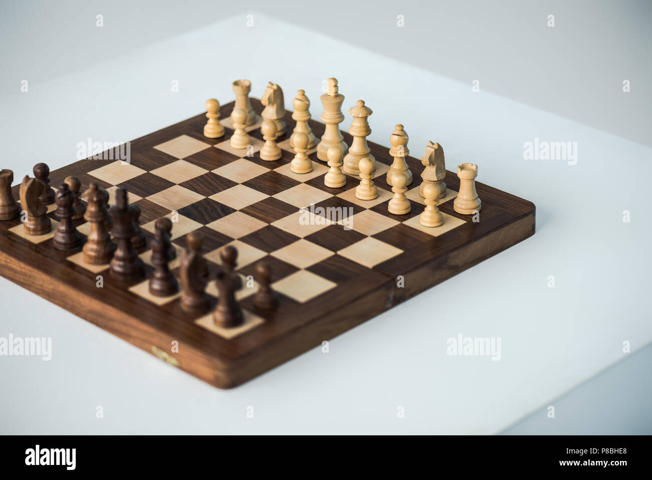 High angle view of chess board with chees pieces set for new game ...